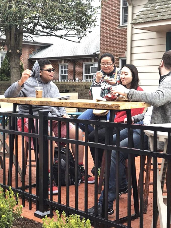 The outdoor patio&mdash;where coffee meets community. Nothing beats watching the world go by with a hot cup and good company on a perfect Delaware morning.