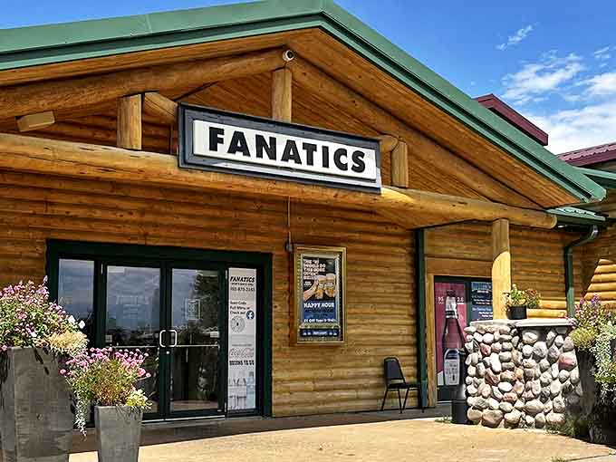 Fanatics Sports Bar's rustic log exterior promises cold drinks and warm welcomes, where everyone knows the score&mdash;in more ways than one.