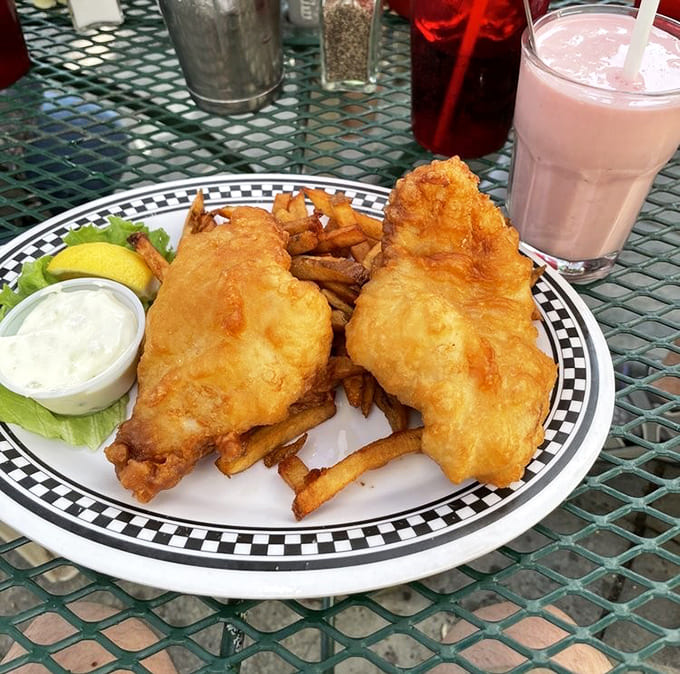 Golden-battered fish and chips that would make Neptune himself swim to Vermont. That strawberry shake on the side? Dessert masquerading as a beverage.