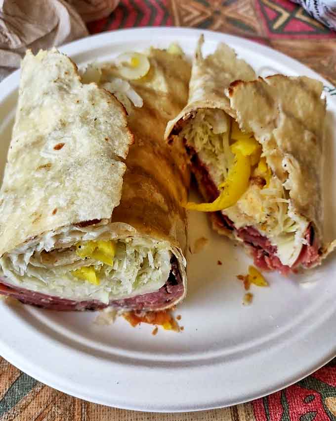 This pastrami creation isn't just a sandwich&mdash;it's a work of art wrapped in wax paper. The kind that makes you want to applaud.
