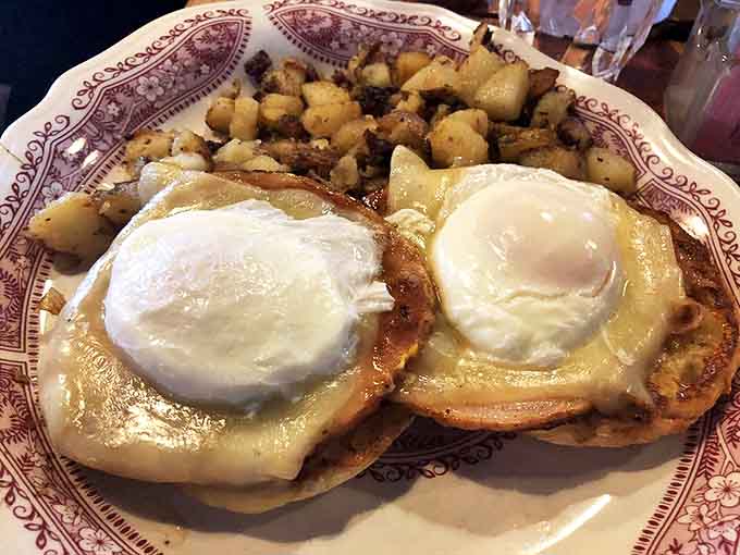 The Mendon Miler in all its glory &ndash; poached eggs perched atop English muffins with Canadian bacon. Hollandaise? Who needs it when you've got Vermont cheddar?
