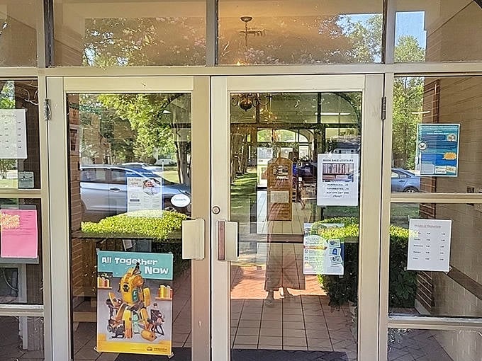 The Morehouse Public Library entrance beckons with the promise of endless adventures that won't cost a penny from your fixed income.