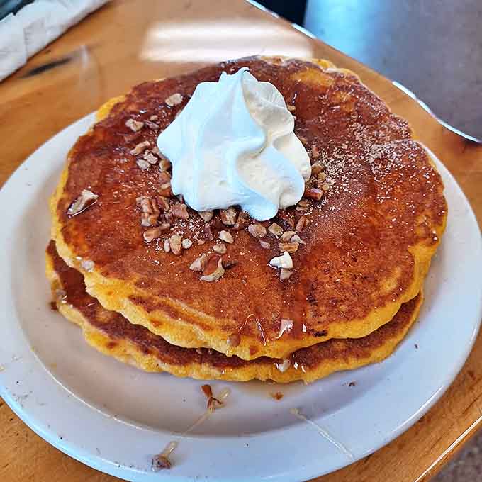 Pancakes topped with a cloud of whipped cream and nuts&mdash;the breakfast equivalent of winning the lottery without having to share it.