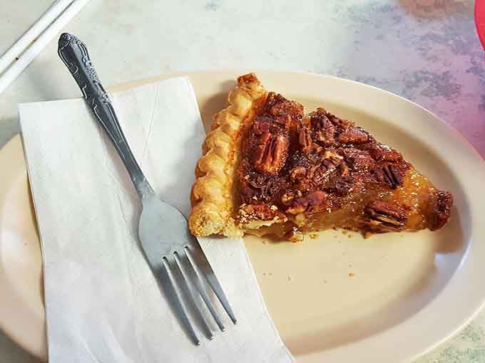 A slice of pecan pie that could make a grown Mississippian weep with joy. Buttery crust, gooey filling, and perfectly arranged pecans&mdash;dessert divinity.