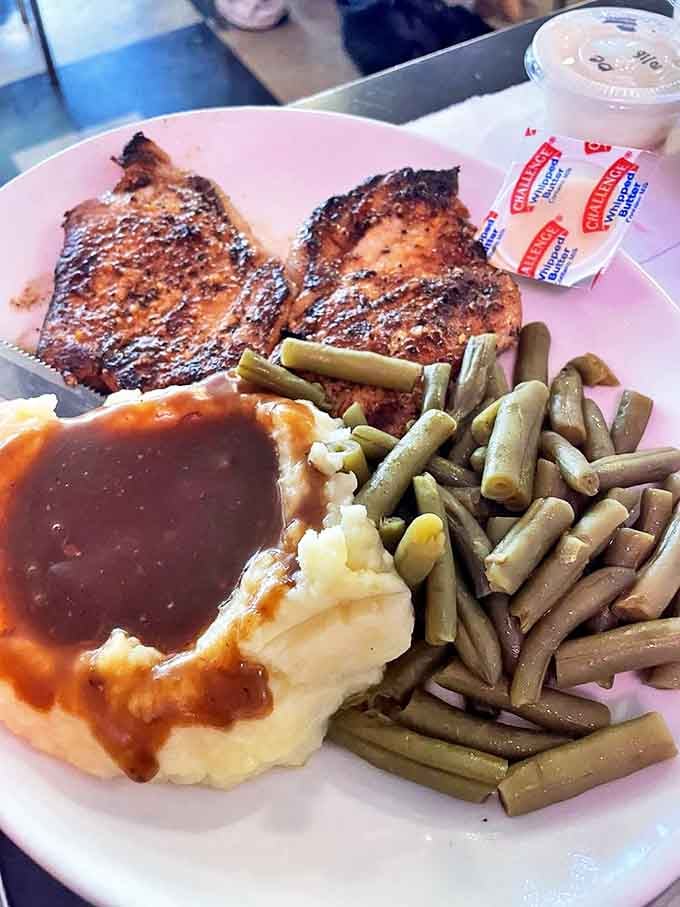 Pork chops, mashed potatoes, and green beans &ndash; the holy trinity of diner dinners that would make your grandmother nod in approval.