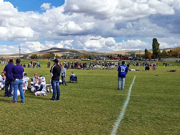 Weekend warriors and future NFL stars share the same grass at Portneuf Wellness Complex, where mountains frame every touchdown.