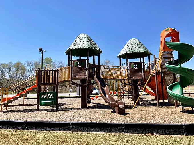 Childhood laughter echoes across this wooden castle playground, proving that in Tarboro, affordable living includes the priceless sound of kids having actual outdoor fun instead of staring at screens.