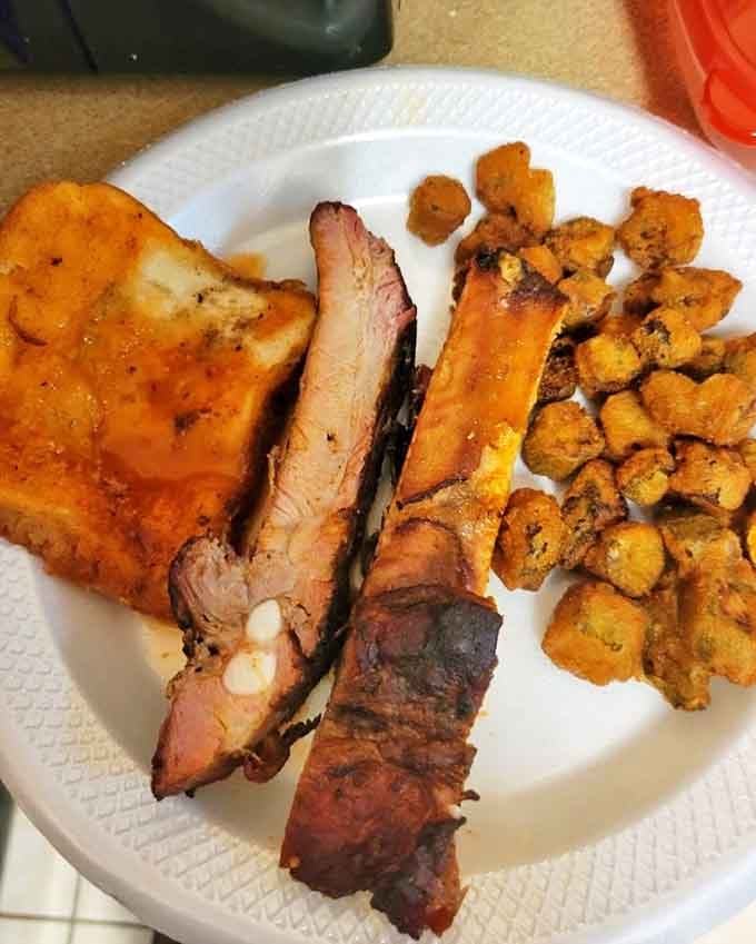 Ribs so perfectly cooked they should be in a museum. But thankfully, they're on a plate instead, ready for your immediate appreciation.