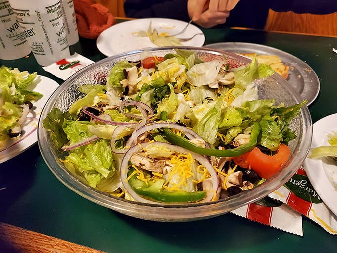 A salad that doesn't apologize for being healthy—crisp, colorful, and substantial enough to hold its own alongside pizza royalty.