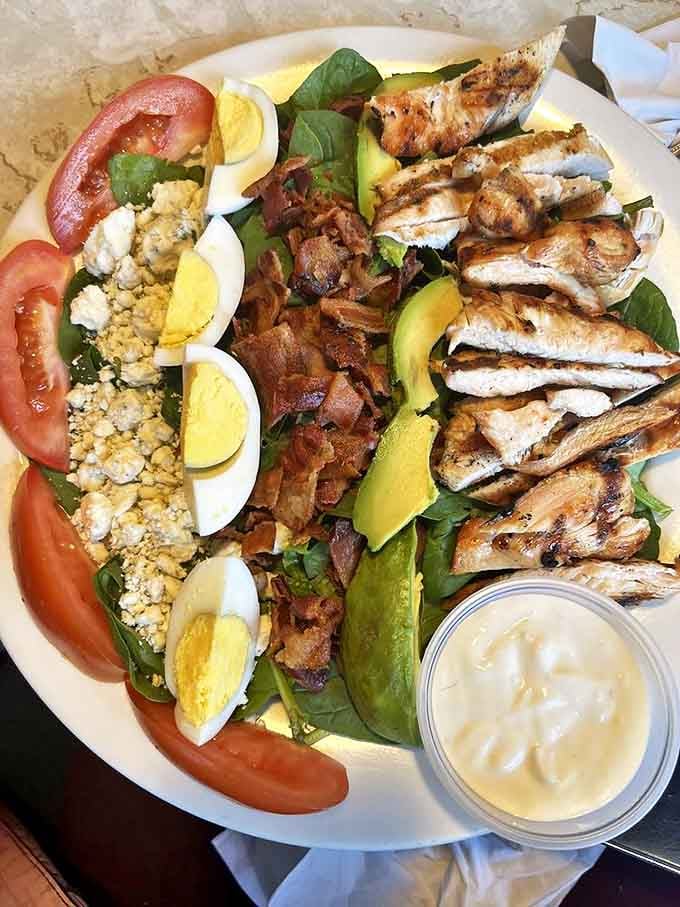 A salad that doesn't feel like punishment. Grilled chicken, avocado, eggs, and bacon make this green affair something to celebrate.