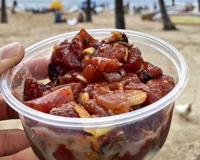 Beach poke is its own food group. The ocean backdrop isn't just scenery&mdash;it's a reminder of where your lunch was swimming not long ago.