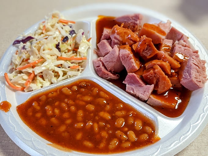The holy trinity of BBQ sides: smoky beans, creamy potato salad, and tangy slaw. Supporting actors that deserve their own spotlight.