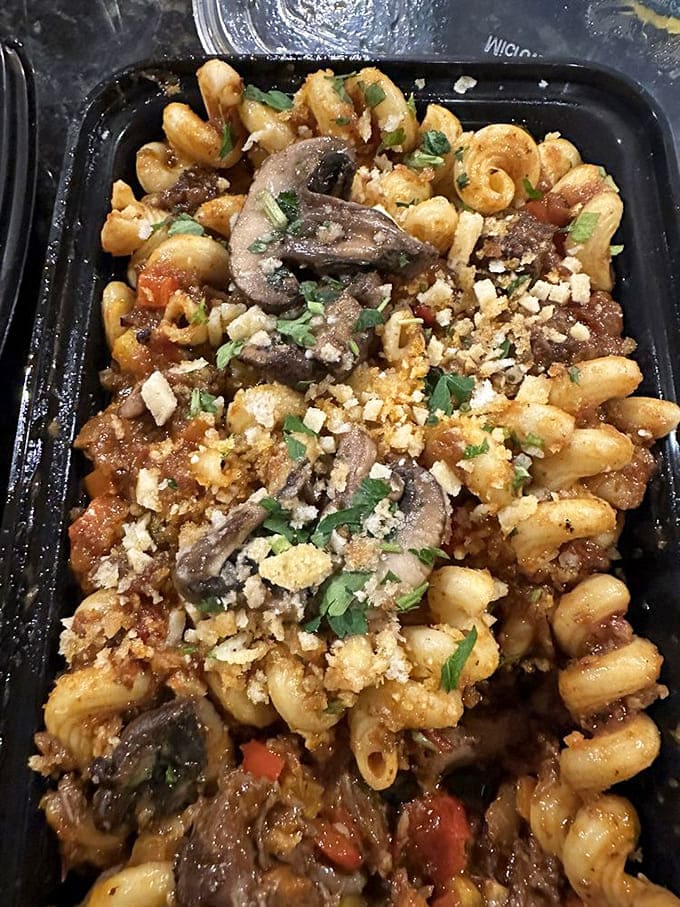 Pasta that's gone to finishing school in the South. Those mushrooms, meat, and perfectly cooked cavatappi are having the reunion we all needed.