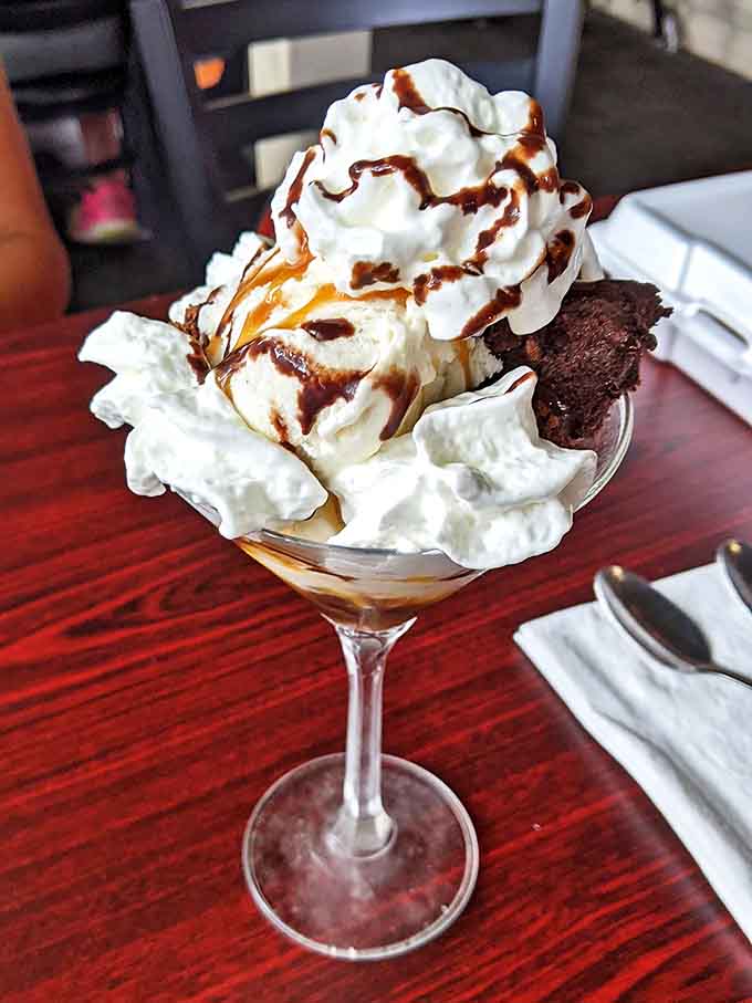 The ice cream sundae that makes adults remember why being a kid was so great. Whipped cream mountains and chocolate sauce rivers&mdash;geography never tasted so good.
