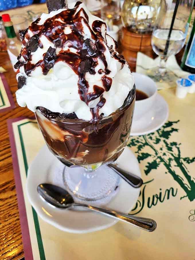 Not just a sundae, but a towering monument to the eternal marriage of hot fudge and cold cream. Spoon jousting encouraged.