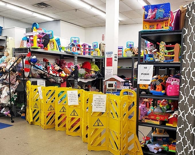 Toy paradise behind safety barriers. Smart move&mdash;otherwise kids would disappear into this plastic wonderland, never to return to the clothing section.