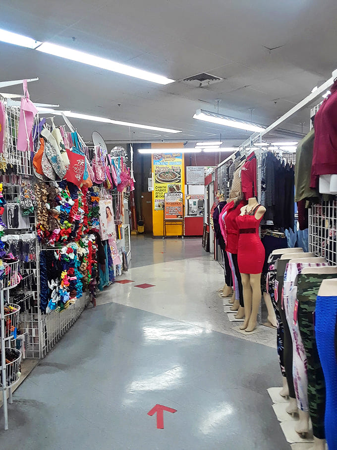 Red arrows guide shoppers through the labyrinth of fashion finds. The mannequins have seen it all and still manage to look fabulous.