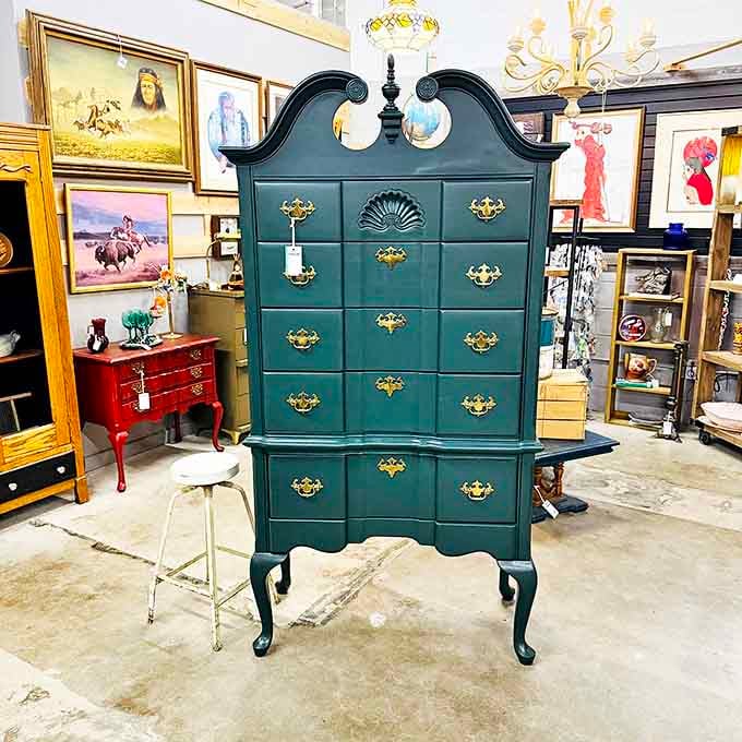 This majestic green highboy doesn't just store your clothes&mdash;it makes them feel like they've been promoted to royalty.