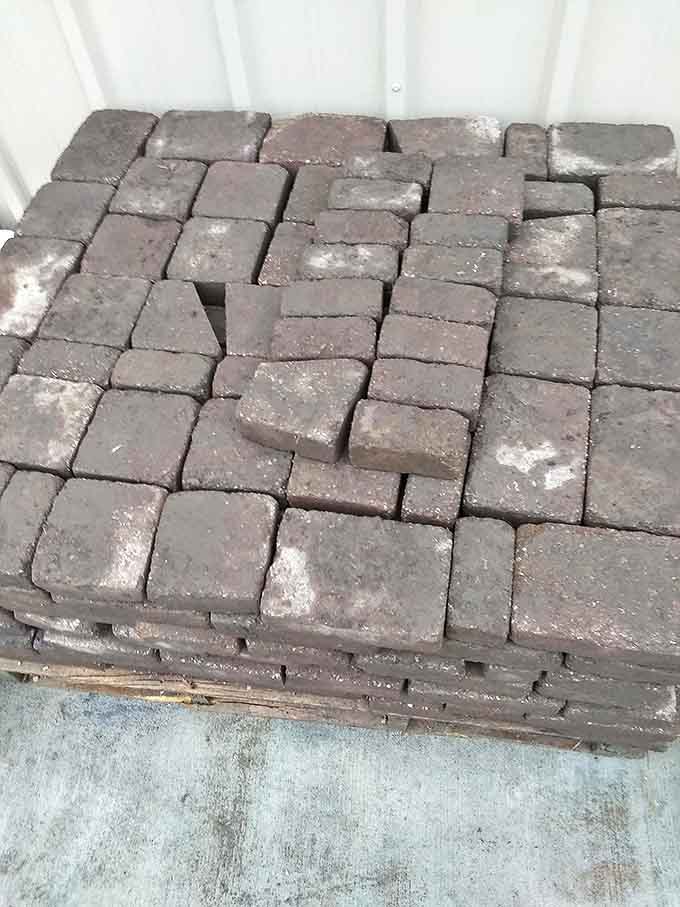 These pavers aren't just bricks—they're the building blocks of future patios where memories of summer barbecues are waiting to happen.