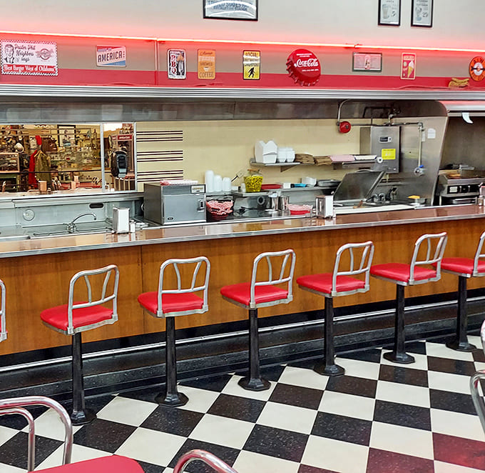 The counter seating isn't just functional—it's theater in the round, where you can watch short-order wizards transform simple ingredients into comfort food magic.