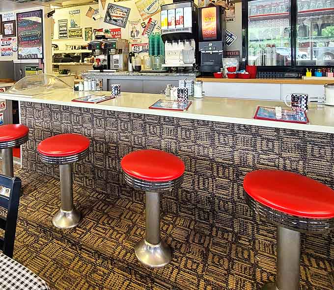 Counter culture at its finest—where solo diners become regulars and the red stools have witnessed more local gossip than a barber shop.