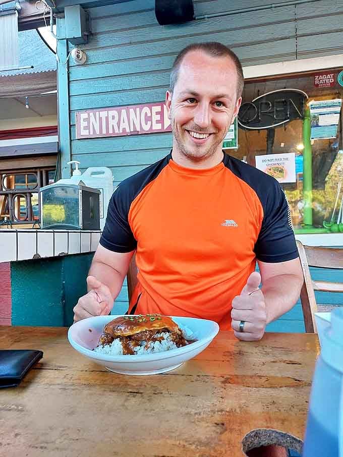 The colorful interior feels like dining inside a Hawaiian sunset. Every chair tells a story; every table has hosted countless "mmms" of approval.