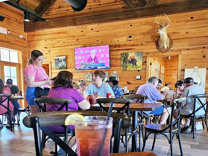 The dining room hums with the universal language of good food, where servers become temporary tour guides through culinary territory.