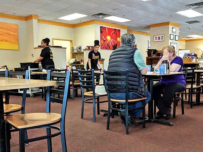 The dining area hums with the gentle symphony of forks against plates and coffee being poured &ndash; breakfast's natural soundtrack.