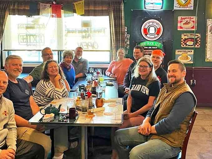The true measure of a pub isn't just its food but its ability to create community. These smiling faces around the table aren't just dining&mdash;they're creating memories over shared plates.