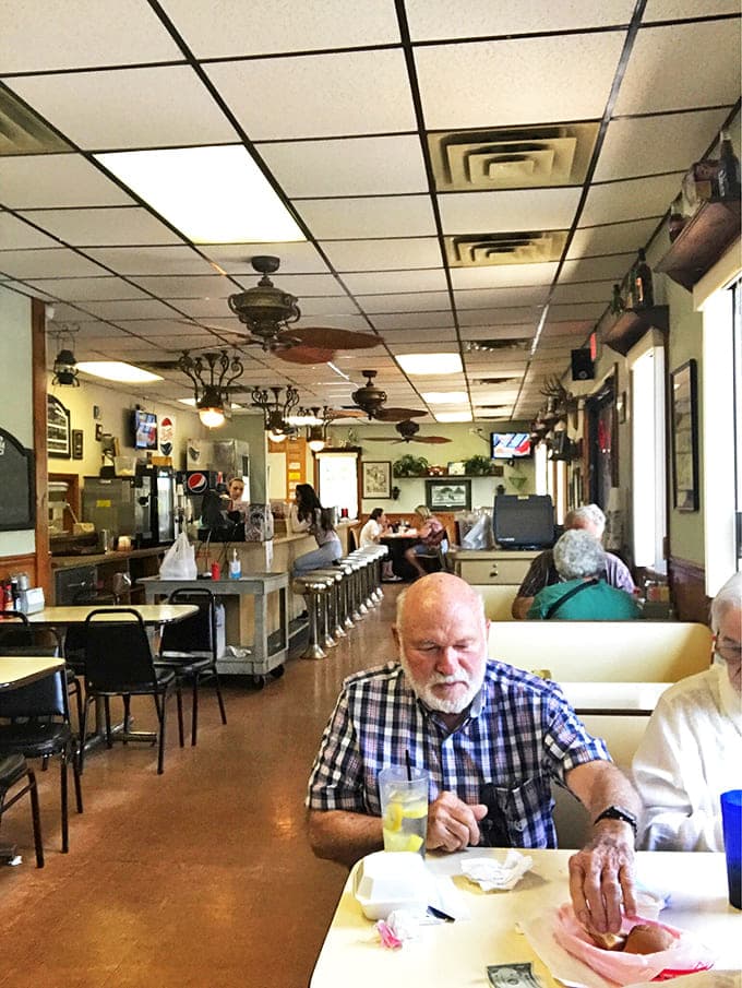 The dining area hums with conversation and ceiling fans, creating the perfect soundtrack for a meal that doesn't need Instagram to validate its worth.