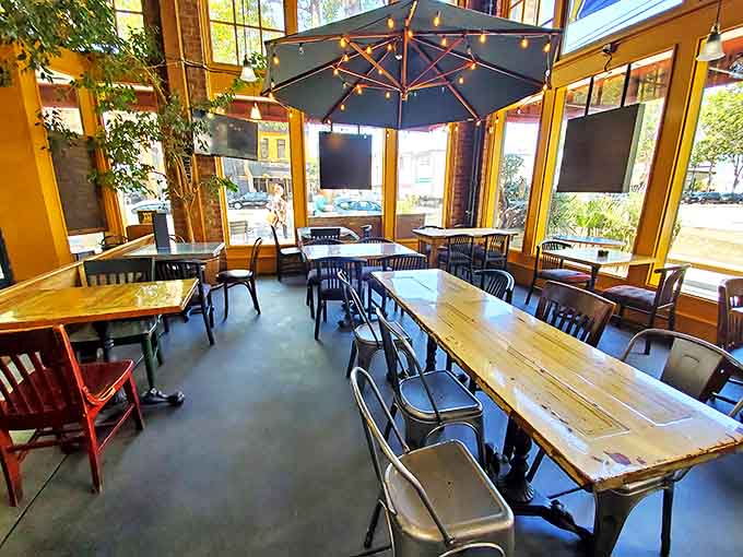 The dining area's warm glow and umbrella lights create the perfect setting for the serious business of getting sauce on your shirt.