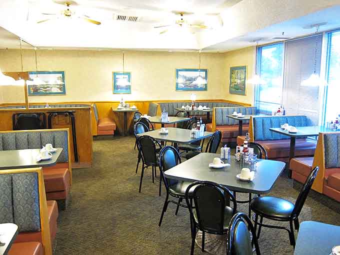 The dining area feels like a comfortable living room where the main activity happens to be eating incredible food instead of watching TV.