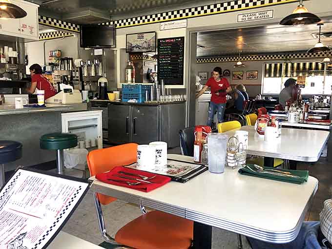 The dining area – where strangers become neighbors and calories don't count if you're having a good conversation.