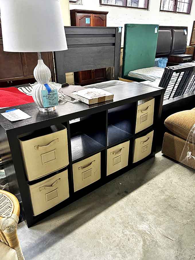 Modern storage meets practical organization &ndash; those fabric bins are just waiting to hide all the evidence of your "slightly messy" lifestyle.