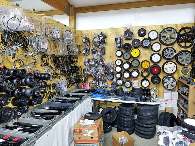 A wall of wheels and mechanical mysteries&mdash;the kind of booth where dads disappear for hours and emerge with "essential" parts.