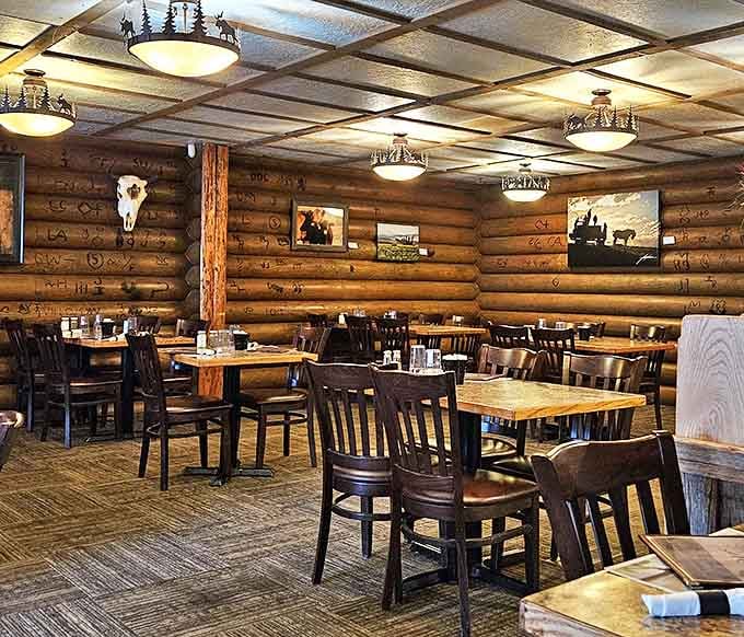 Another angle of beef paradise. Those rustic chandeliers cast the kind of flattering light that makes everyone look like they just returned from vacation.
