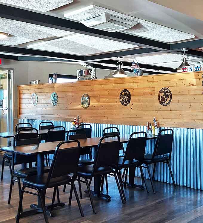 Rustic meets refined with wood paneling and corrugated metal creating the perfect backdrop for conversations that flow as easily as the coffee.