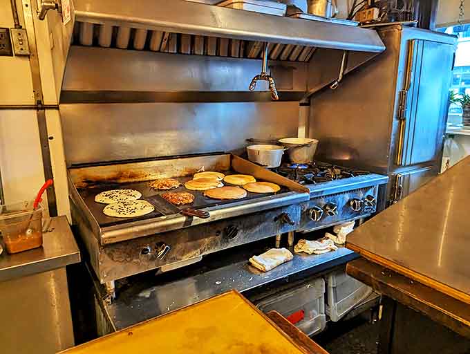 The kitchen at Al's operates like a well-choreographed dance, with pancakes pirouetting on the griddle while eggs perform their sizzling solo.