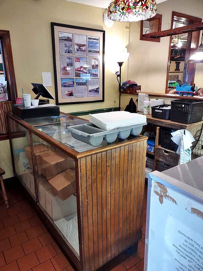 The order counter &ndash; where dreams are placed and hunger pangs go to surrender. Notice the vintage wooden display case that's witnessed thousands of dessert decisions.