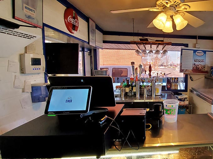 Where breakfast dreams become reality—the order counter at Marie's, command central for the morning's most important decisions.