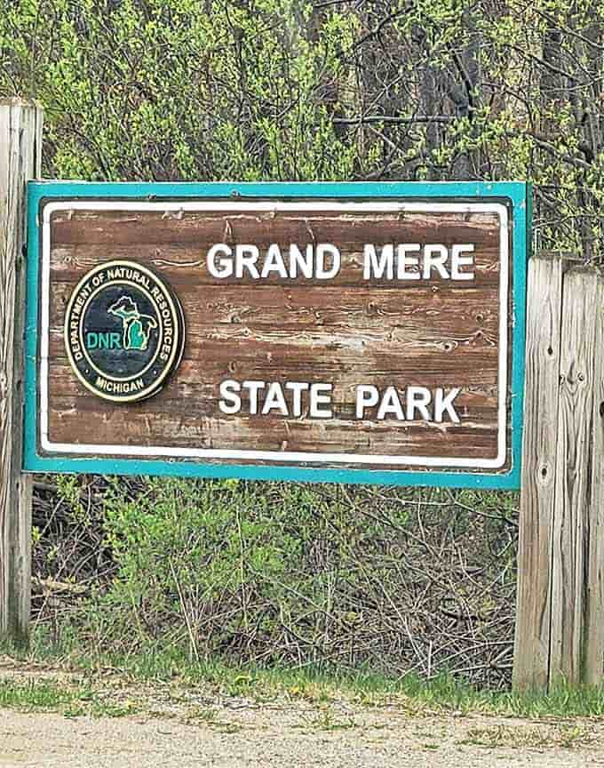 The entrance sign promises adventure without overselling. Like a good host, it simply announces: "The natural wonders speak for themselves."