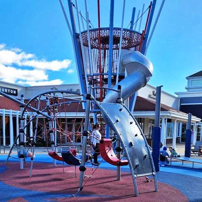 The playground where kids burn energy while parents' credit cards cool down. Shopping breaks never looked so fun or strategically necessary.