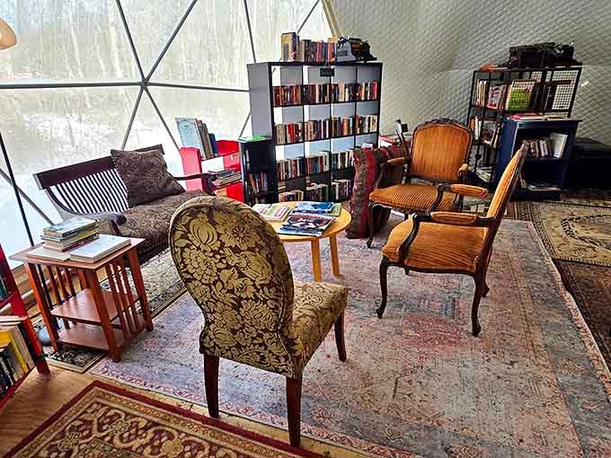 A reading nook straight from a decorator's dream&mdash;vintage chairs with rich upholstery invite you to sit and sample a chapter before buying.