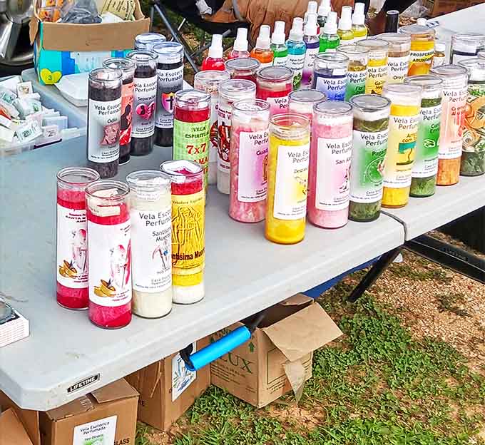 Colorful prayer candles and spiritual items create a kaleidoscope of faith and tradition among the market's more secular offerings.