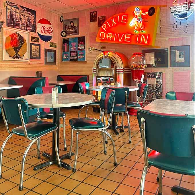 Settle into these vibrant teal chairs and enjoy the wonderful retro atmosphere of this nostalgic, neon-lit 1950s style local diner.