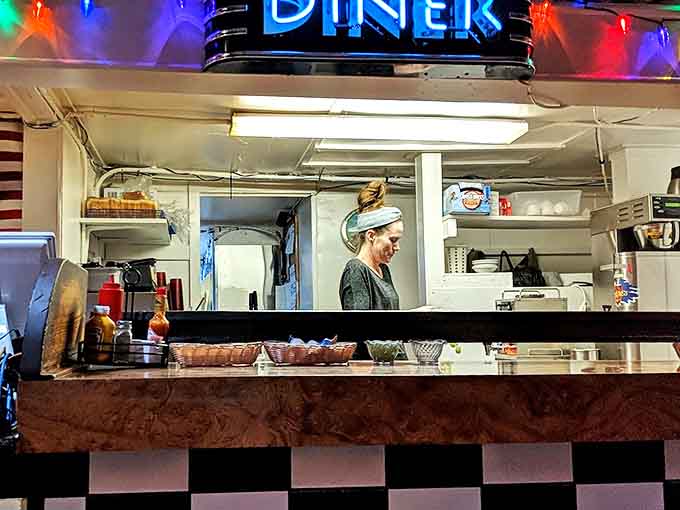 The open kitchen offers dinner and a show, where short-order cooking becomes a choreographed dance of efficiency and skill.