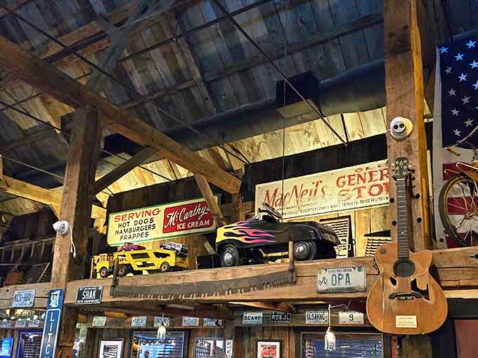The upper level decor feels like barbecue archaeology—vintage signs, toy trucks, and Americana that tell stories between bites of brisket.