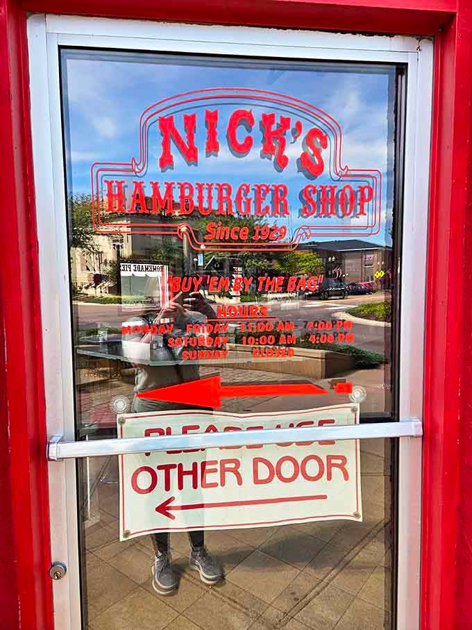 The door sign reveals Nick's has been telling South Dakotans to "Buy 'Em By The Bag" since before most fast food chains existed.