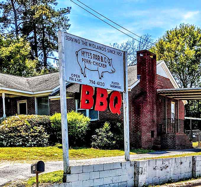 The roadside sign says it all—serving the Midlands since 1957. Some landmarks aren't made of marble; they're made of smoke, meat, and dedication.