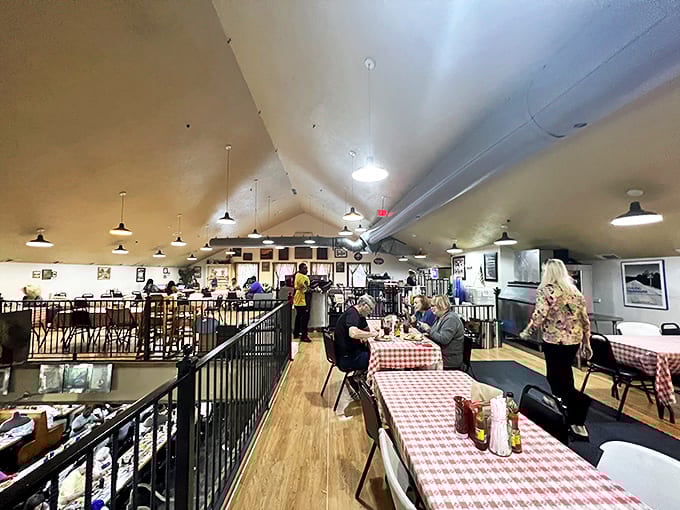 Cathedral-like ceilings and checkered tablecloths create the perfect backdrop for serious eating. This isn't just dining&mdash;it's a Southern ritual.